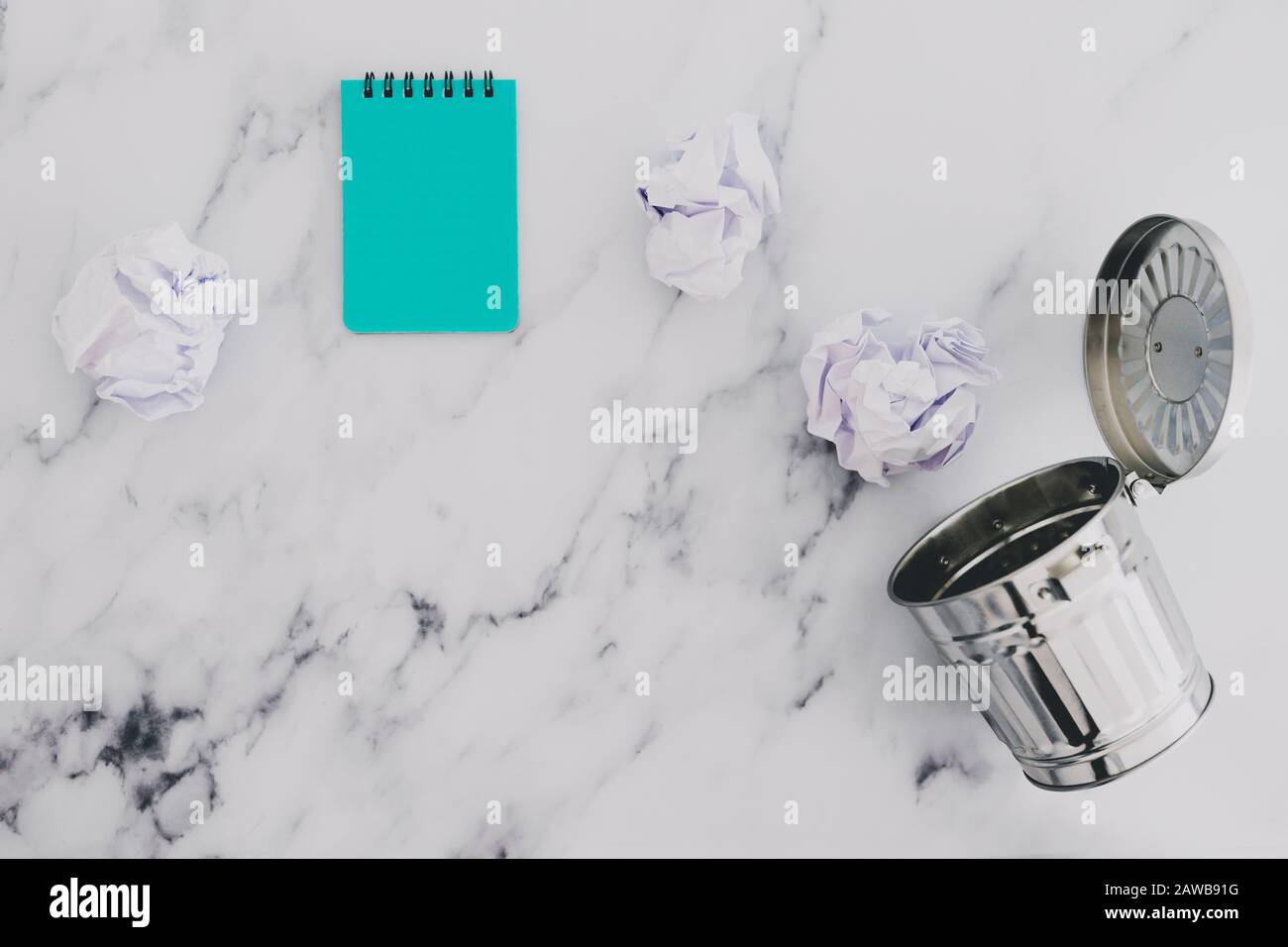 concept of creative block or burnout, group of scrunched paper ball ...