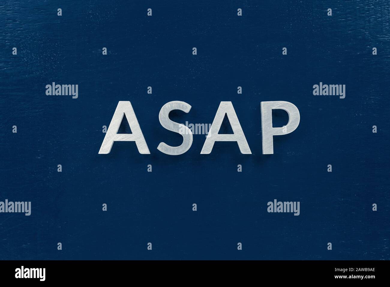 The word asap - as soon as possible - laid with silver metal letters in ...