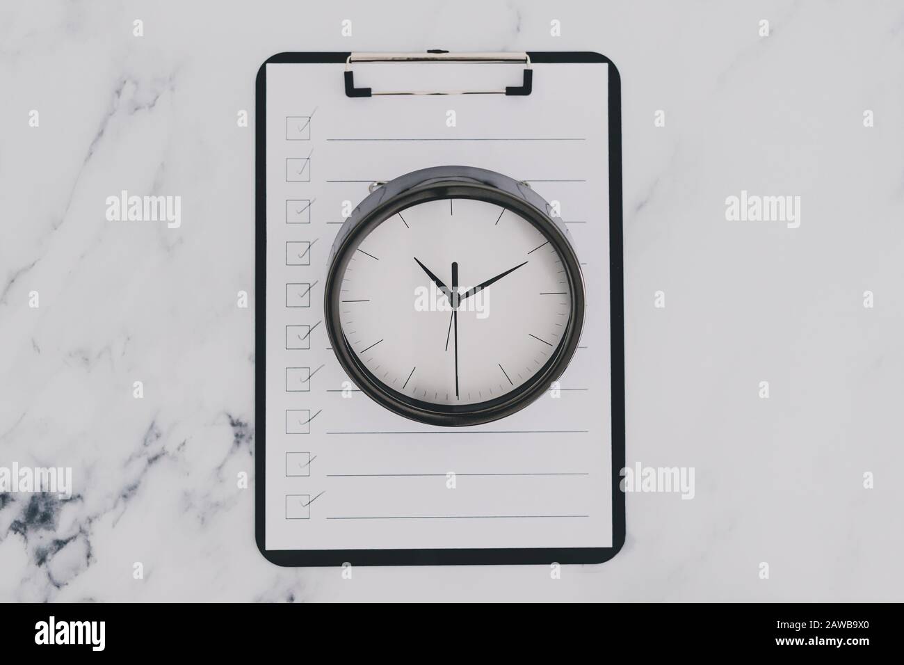 concept of schedules and productivity, to do list on clipboard next to ...