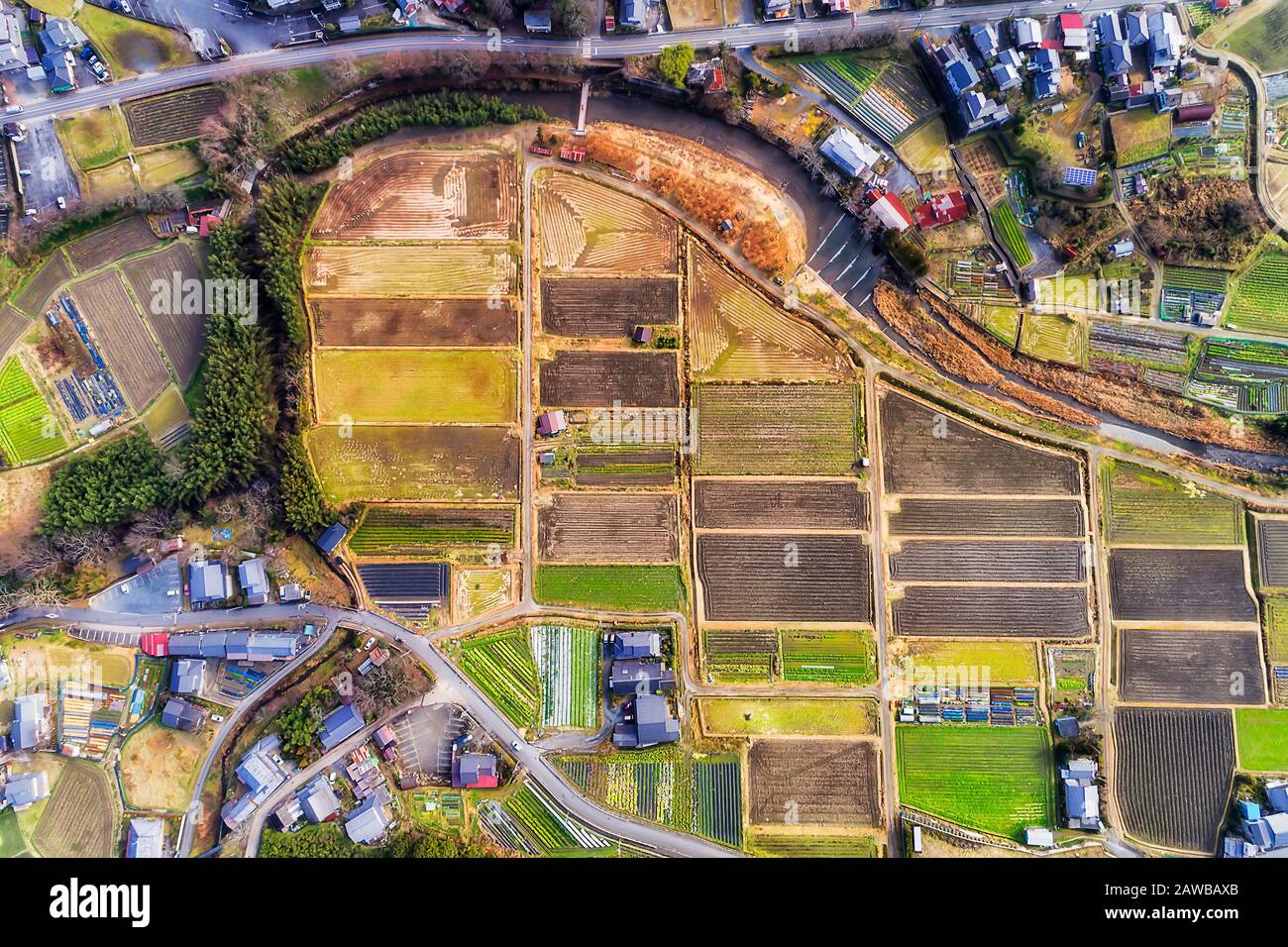 Rice field terraces along small mountain river in Ohara village near ...