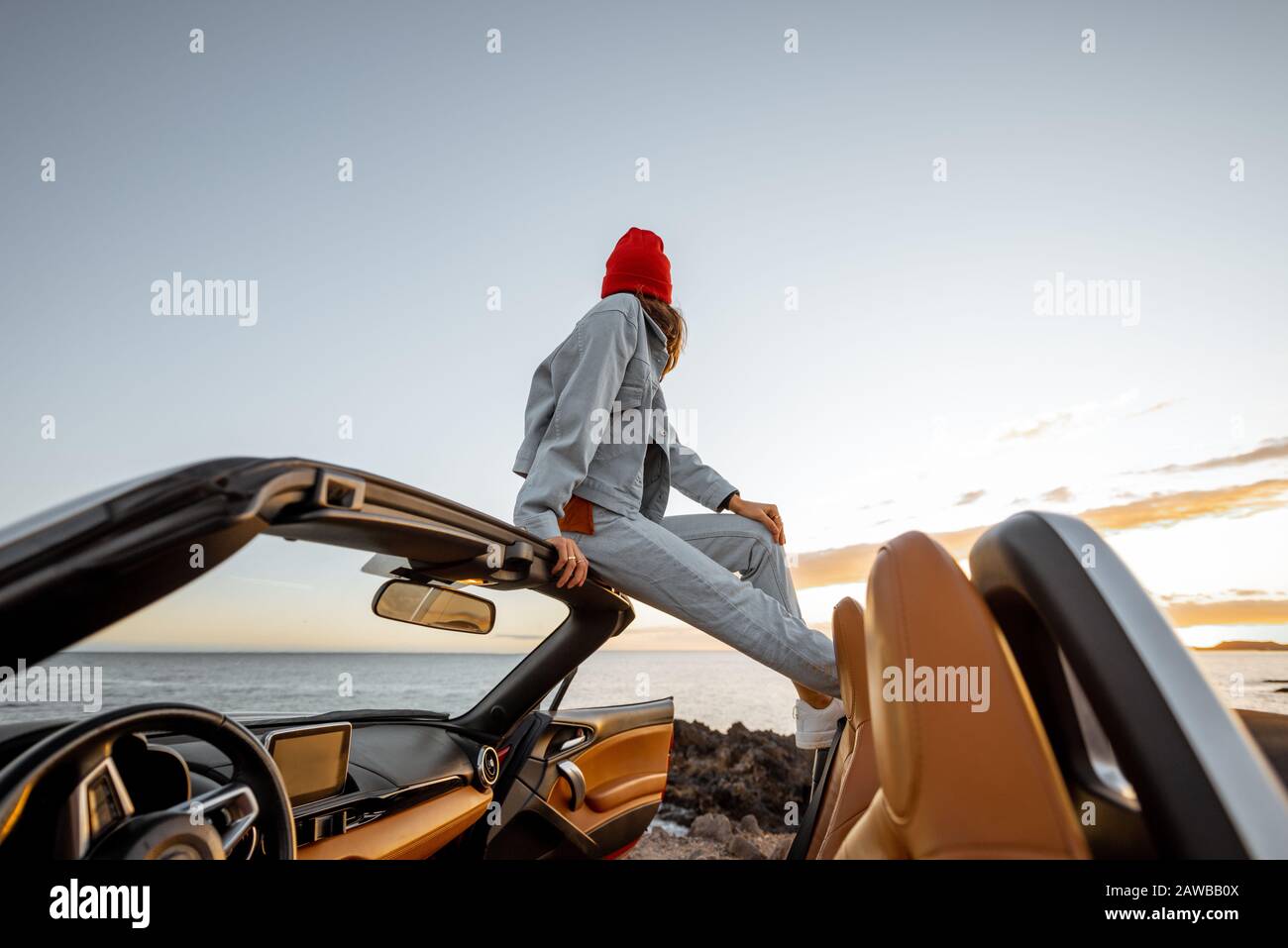 Girl on car roof hi-res stock photography and images - Alamy