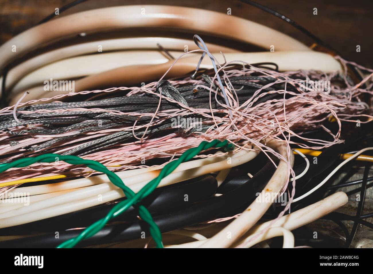 Used electric colorful wires. hank of different old cables close up ...