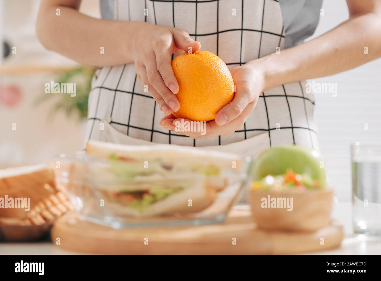 healthy eating, storage, dieting and people concept - close up of woman ...