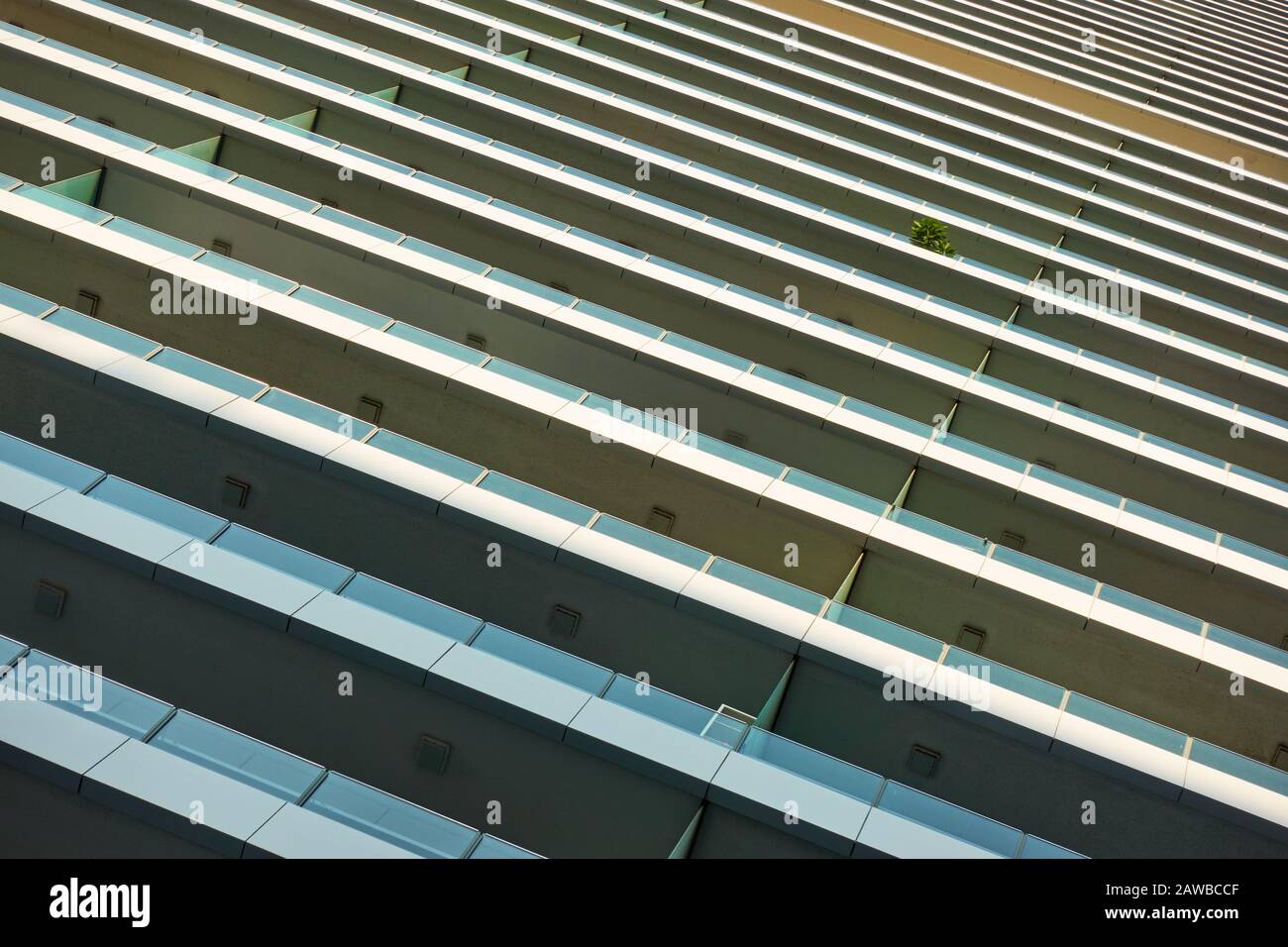 Wall of modern high-rise dwelling house with balconies - architectural ...