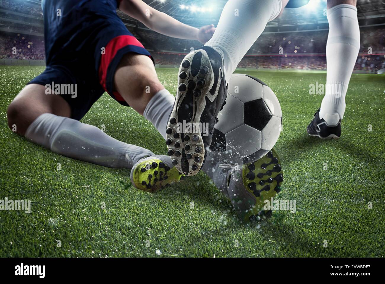 Football scene with competing football players at the stadium Stock ...