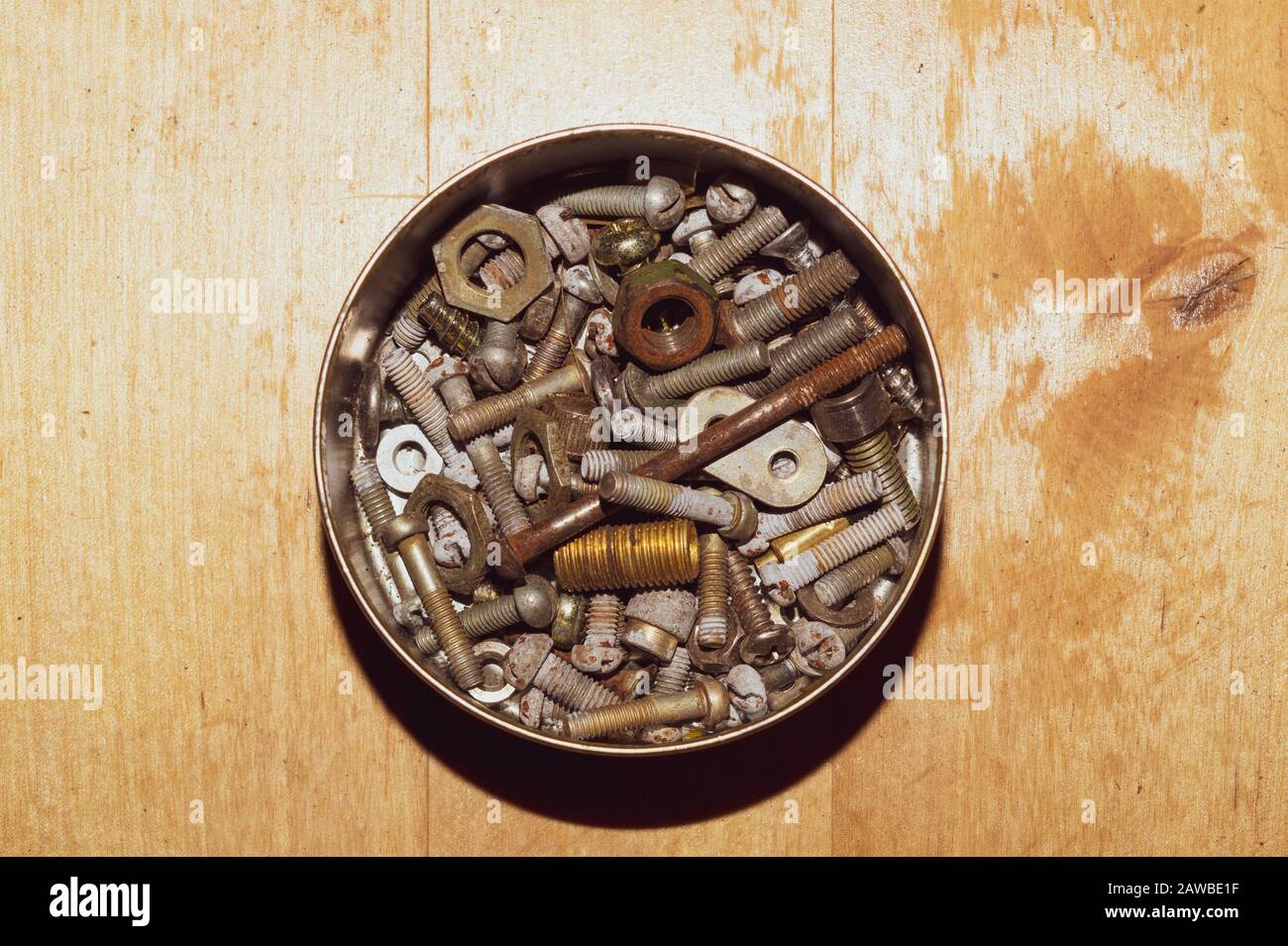 Old screws in a box. a lot of various screws. pile of fasteners in the ...