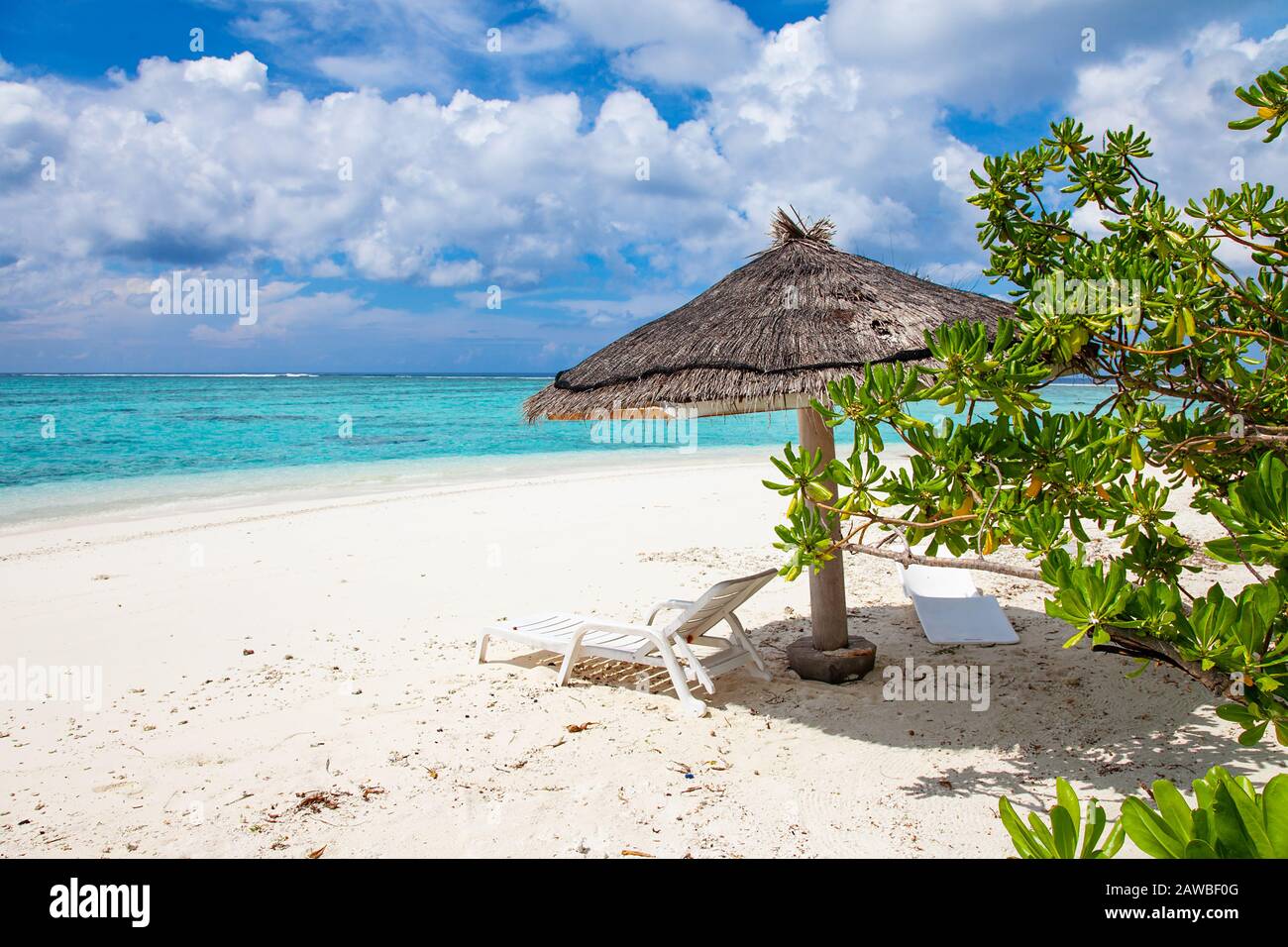 Umbrella, Water and Beach Relax View on Maldive Coast Stock Photo - Alamy