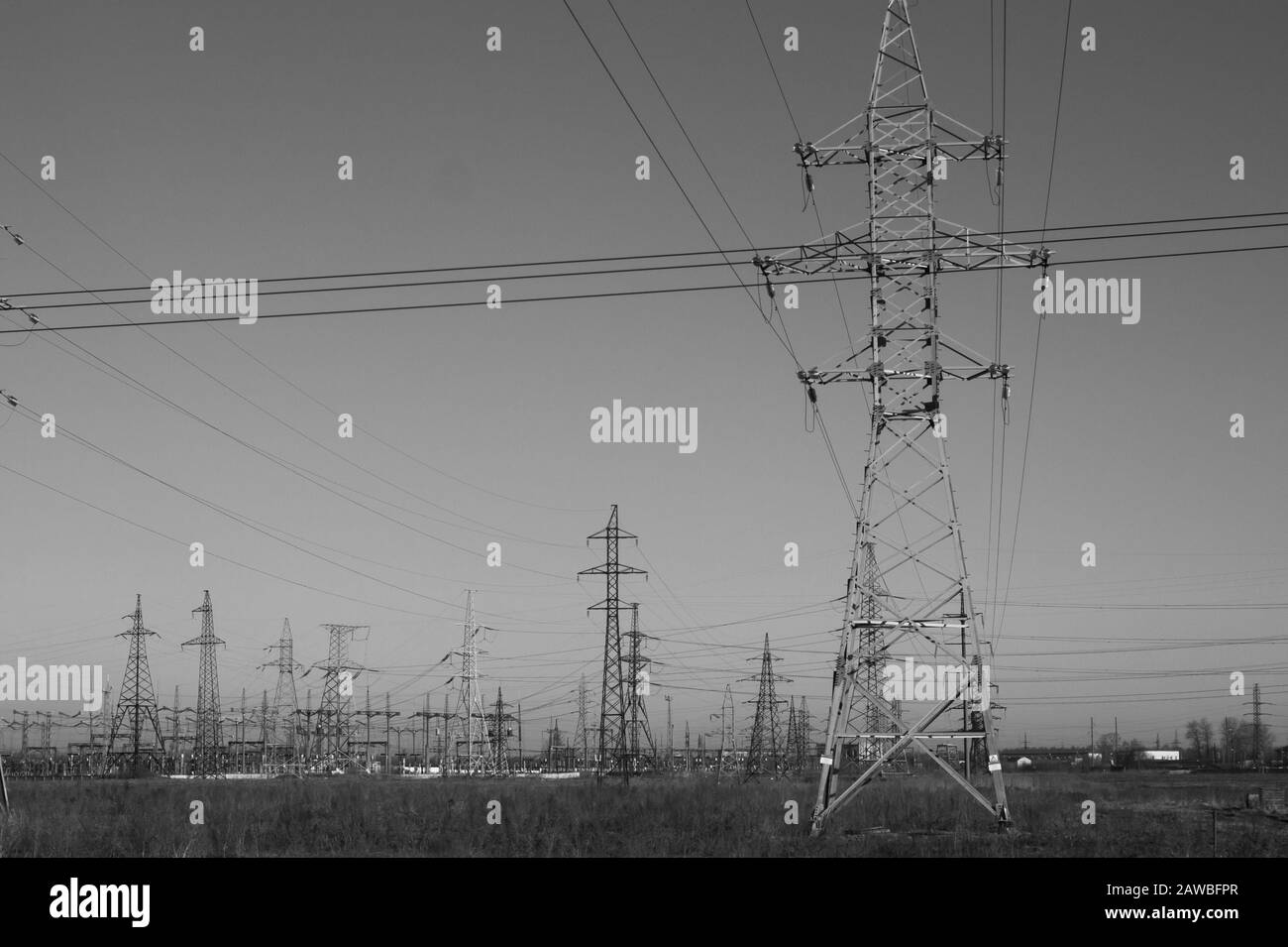 Power line posts. high voltage tower with the sky. industrial ...