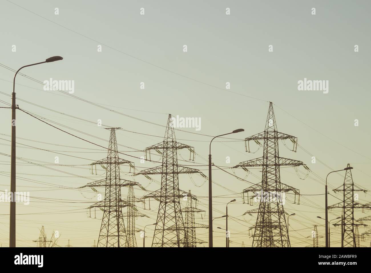 Power line posts. high voltage tower with the sky. industrial ...