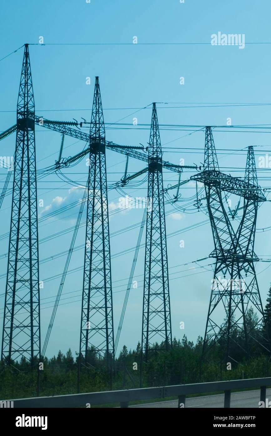 Power line posts. high voltage tower with the sky. industrial ...