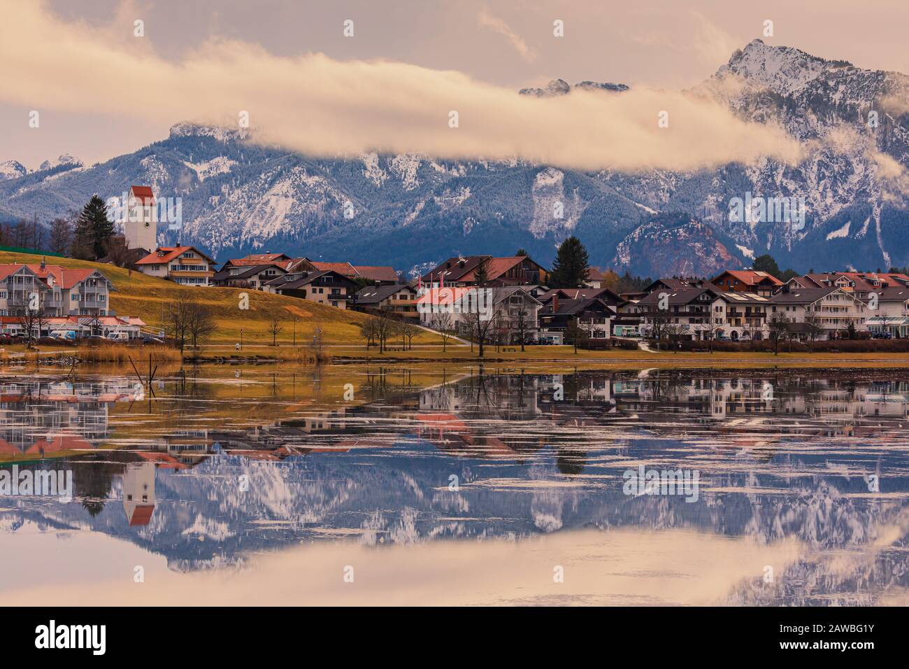 Winter sunrise at Lake Hopfen with the Karwendel mountains in the ...