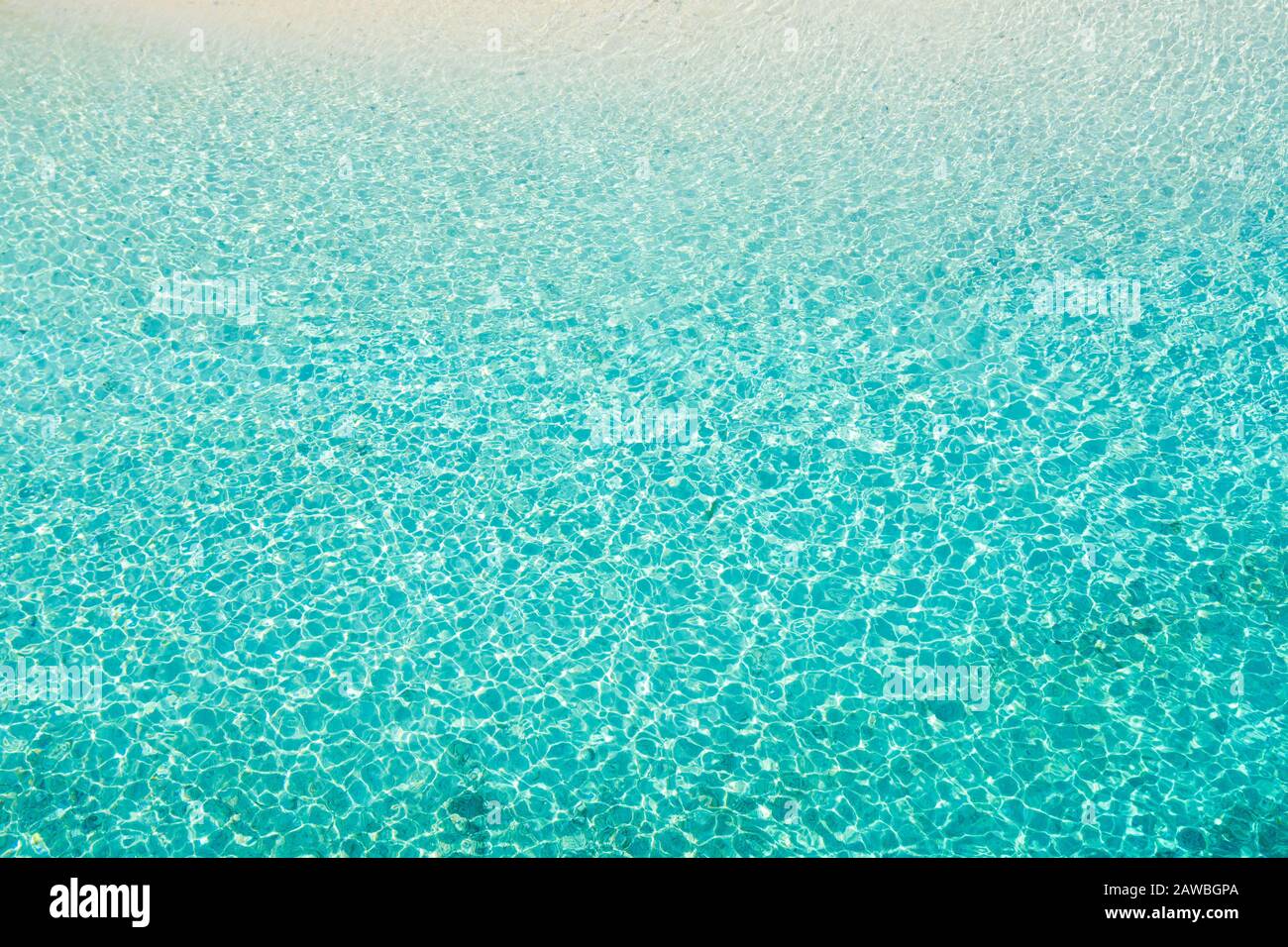 Sea surface in a turquoise lagoon, top view. The texture of sea water ...