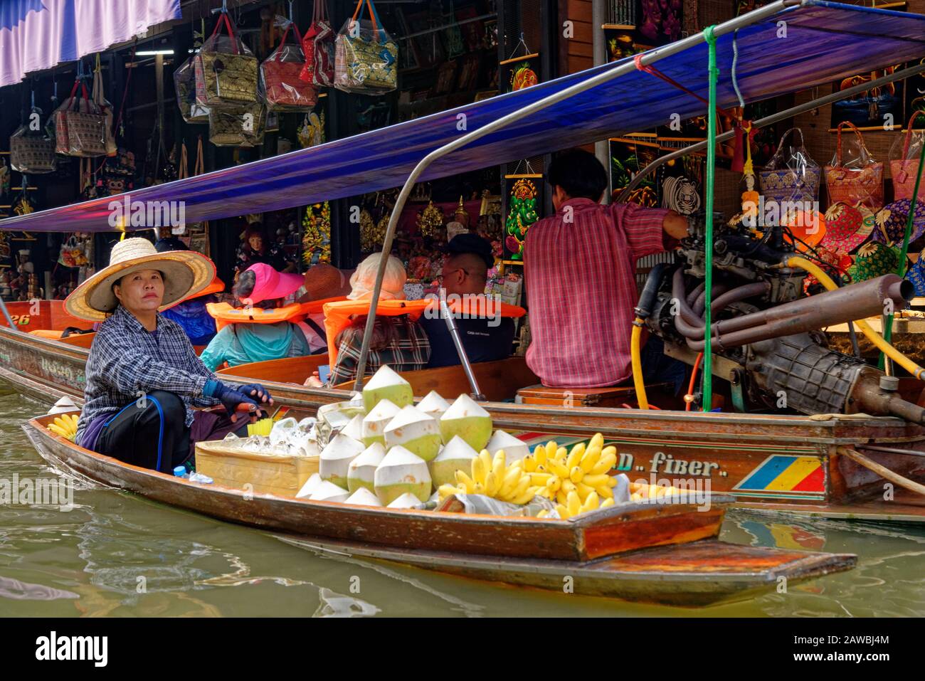 Damnoen Saduak Floating Market is a floating market in Damnoen Saduak ...