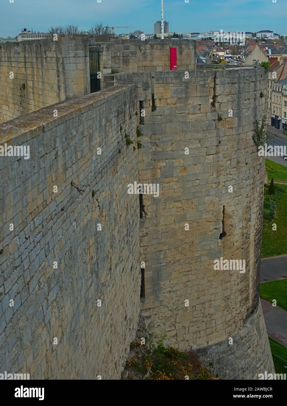 View on huge stone defensive wall and tower at Caen fortress, France ...