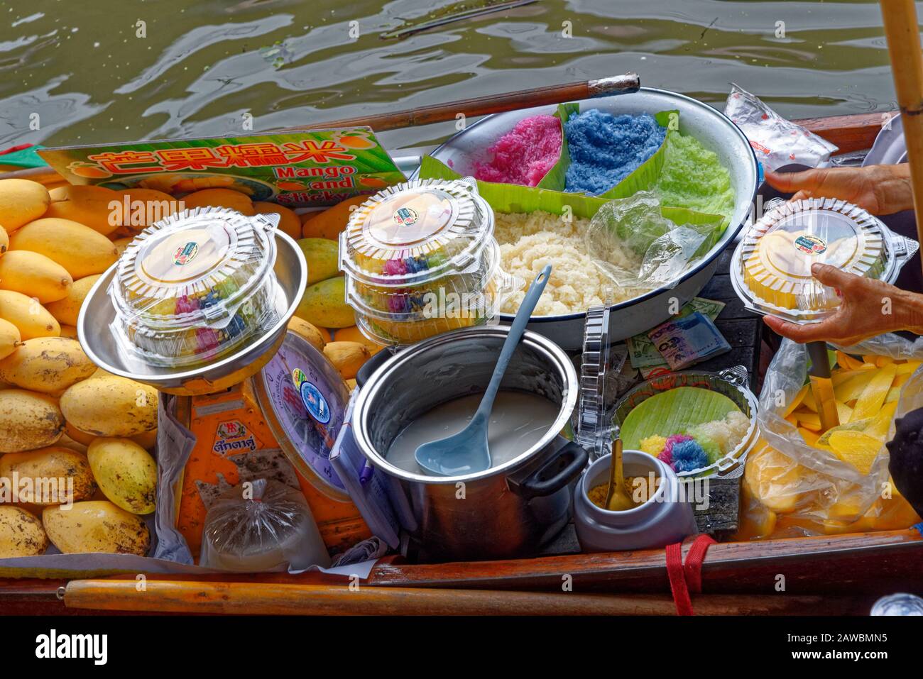 Damnoen Saduak Floating Market is a floating market in Damnoen Saduak ...