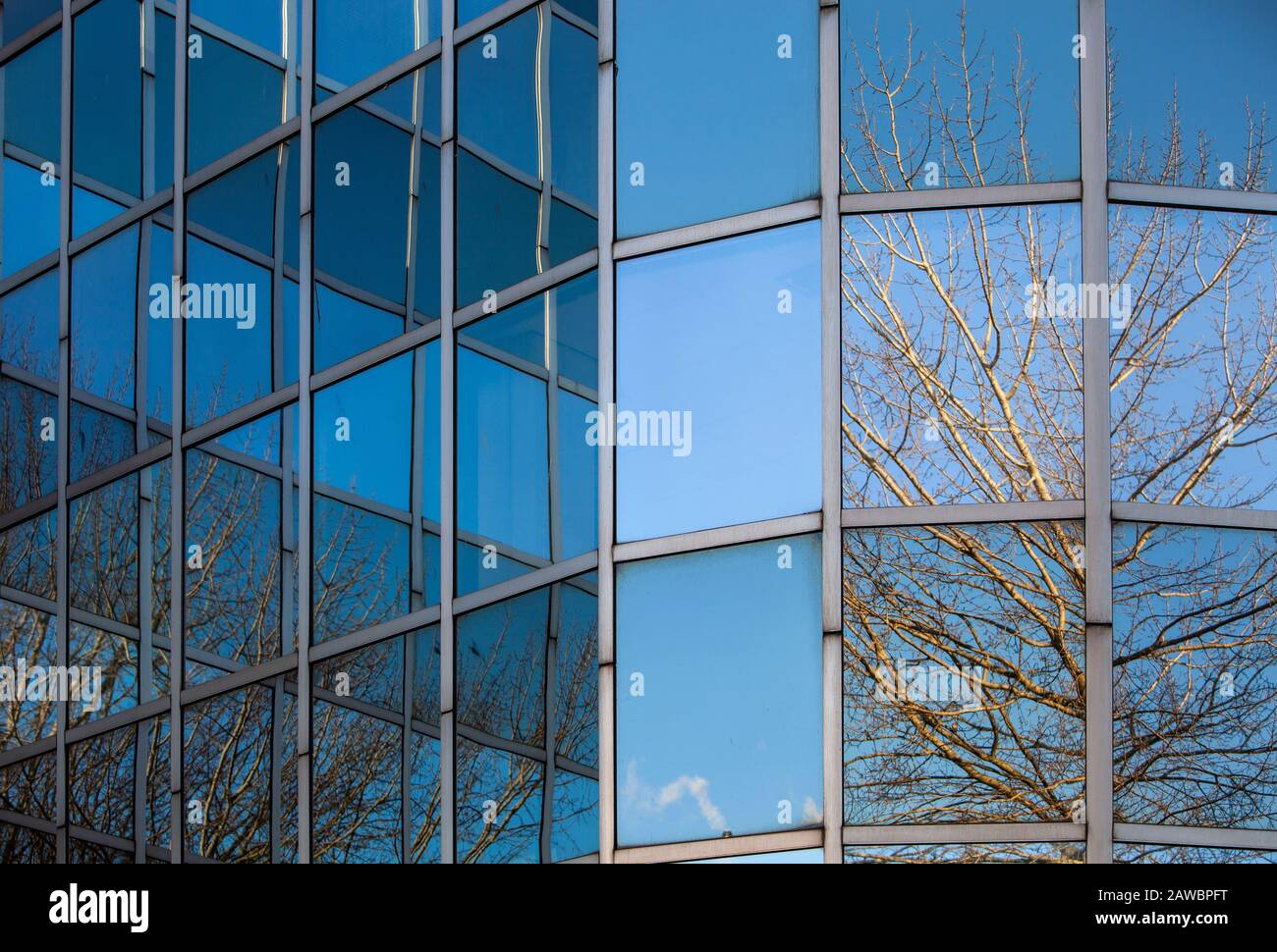 abstract patterns formed by reflections of architecture in windows of ...