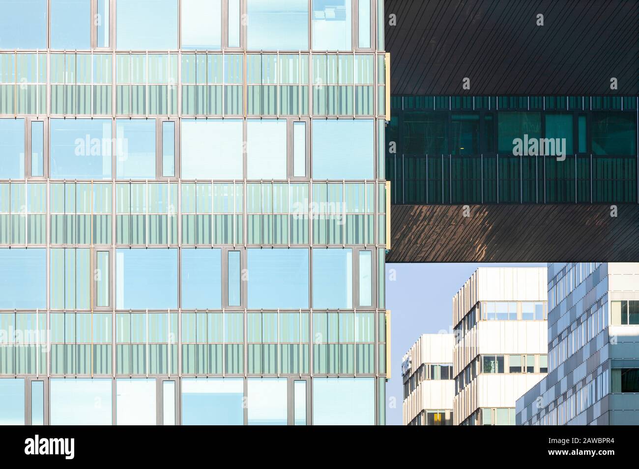abstract patterns formed by reflections of architecture in windows of ...
