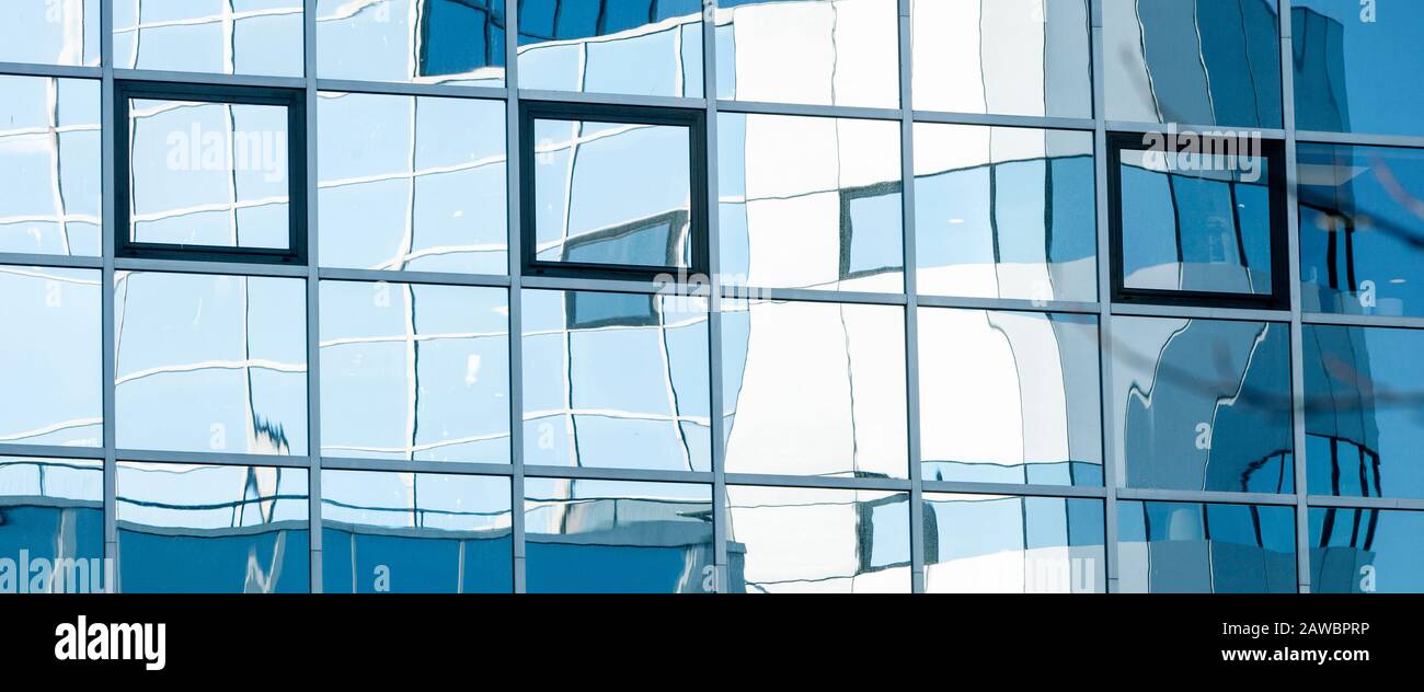 abstract patterns formed by reflections of architecture in windows of ...