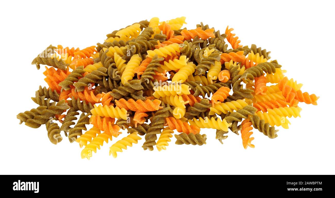 Group of uncooked tricolore fusilli pasta twist shapes isolated on a ...