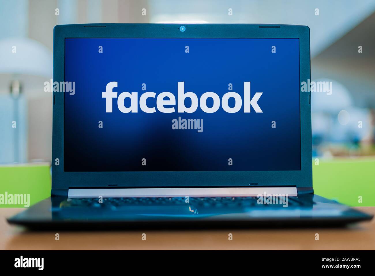 POZNAN, POL - DEC 11, 2019: Laptop computer displaying logo of Facebook ...