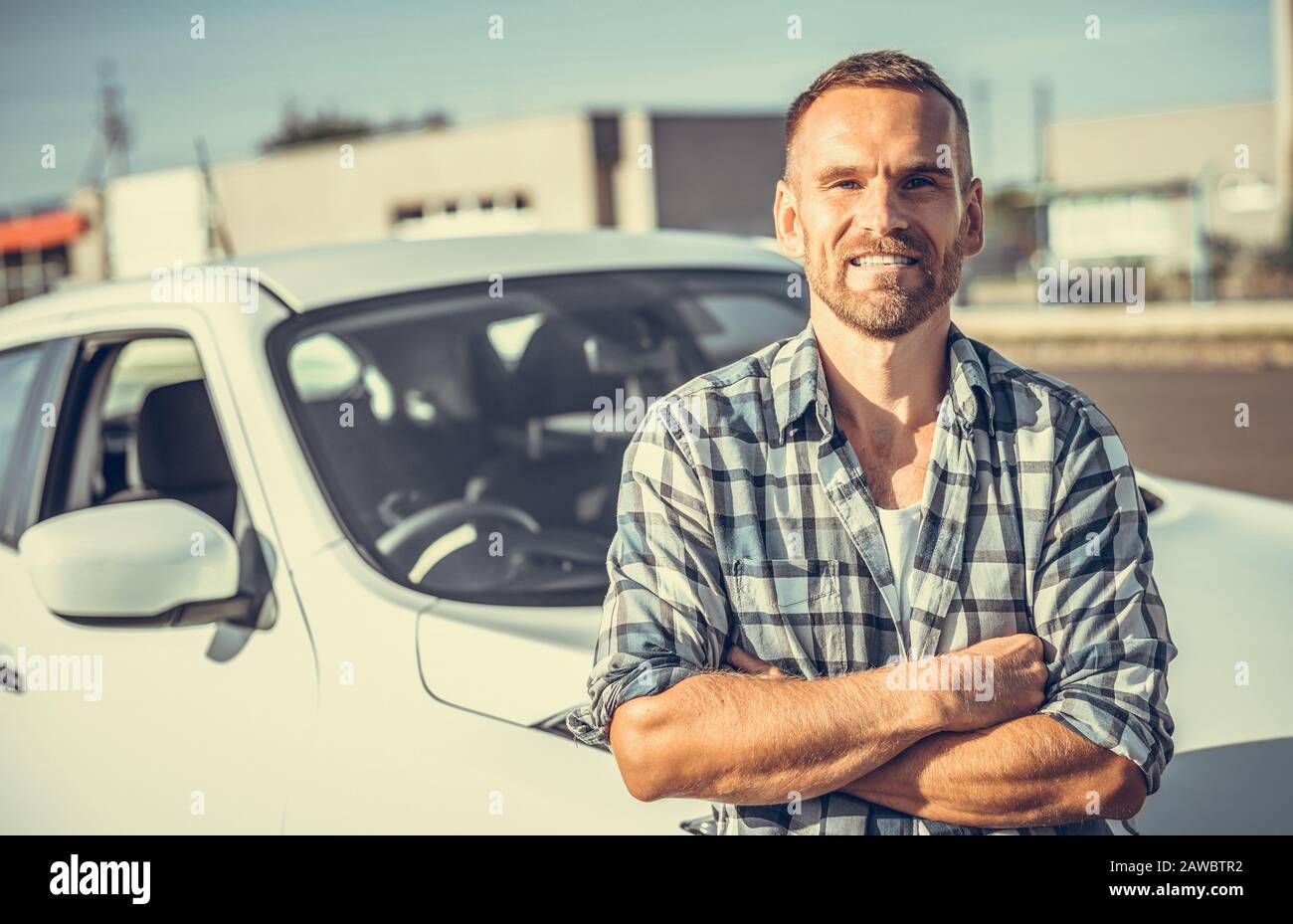 Young successful man stands hi-res stock photography and images - Alamy