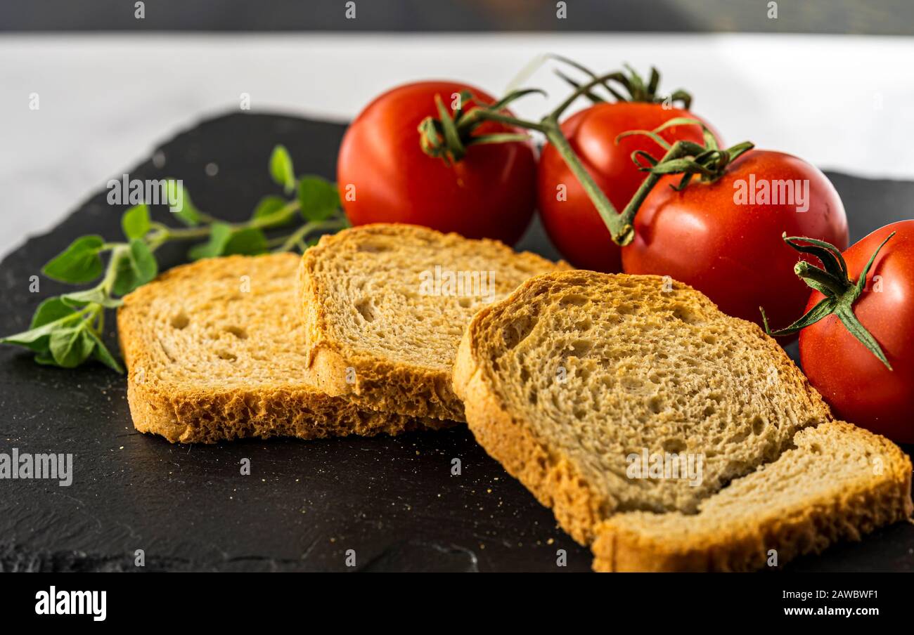 Dry toast and butter. Close-up Stock Photo - Alamy