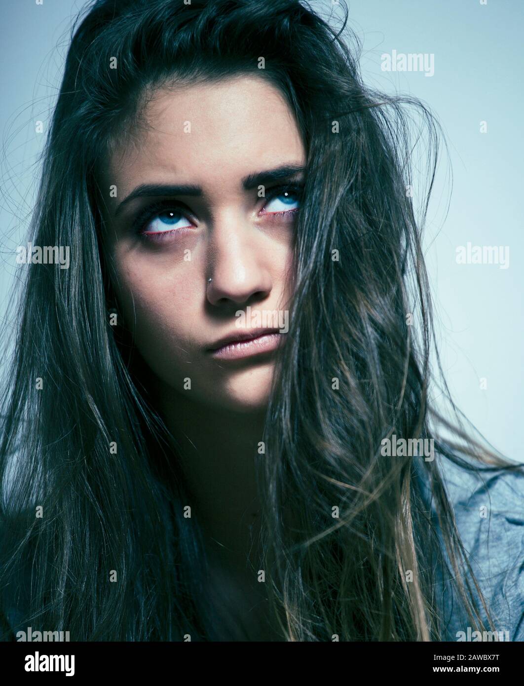 problem depressed teenage with messed hair and sad face Stock Photo - Alamy