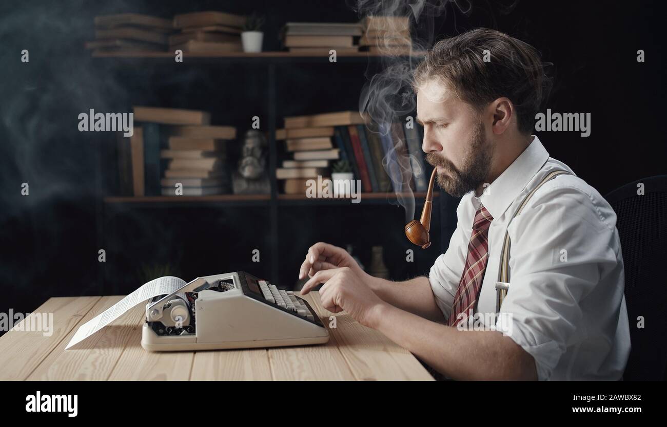 Male using typewriter Stock Photo - Alamy