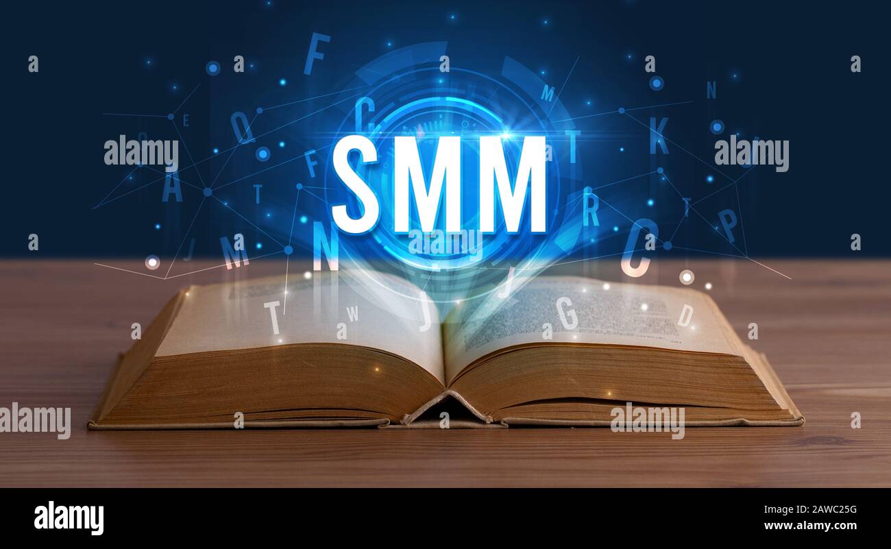SMM inscription coming out from an open book, digital technology ...
