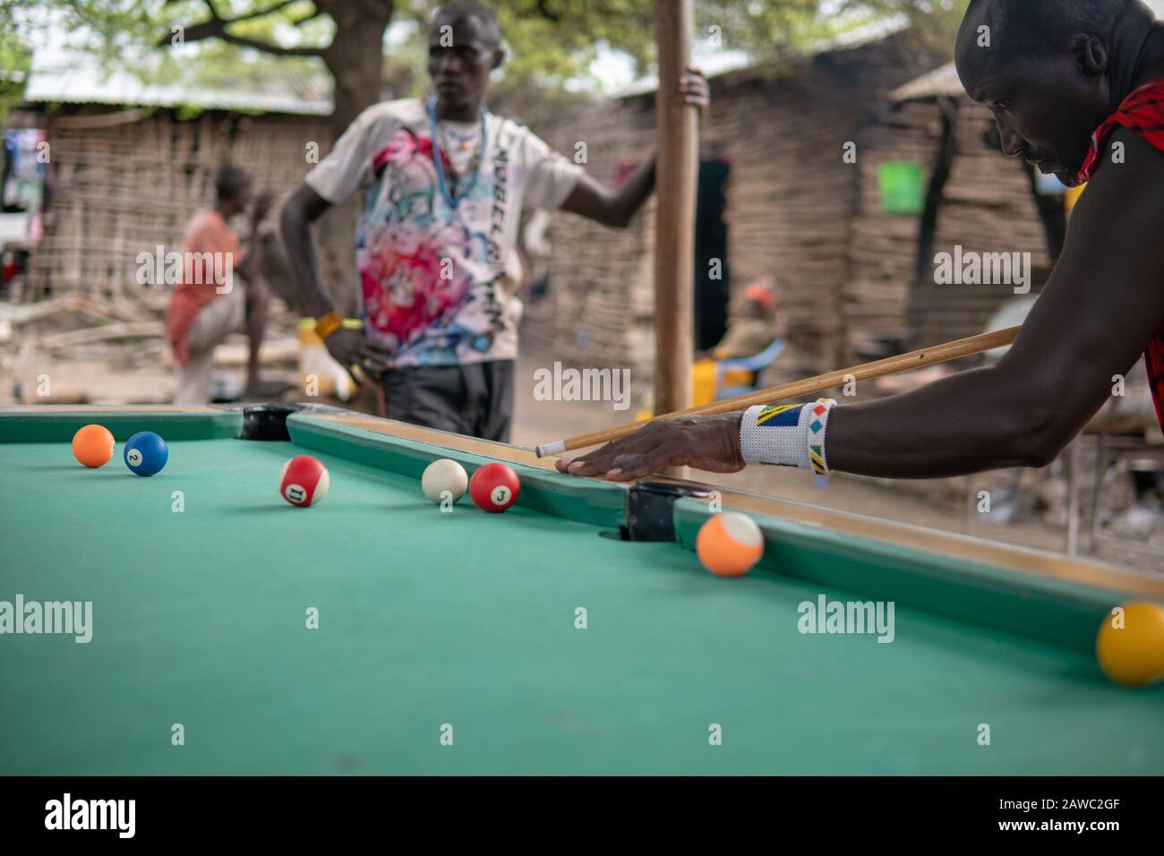 TANZANIA, NATRON LAKE - JANUARY 2020: African masai men playing open ...
