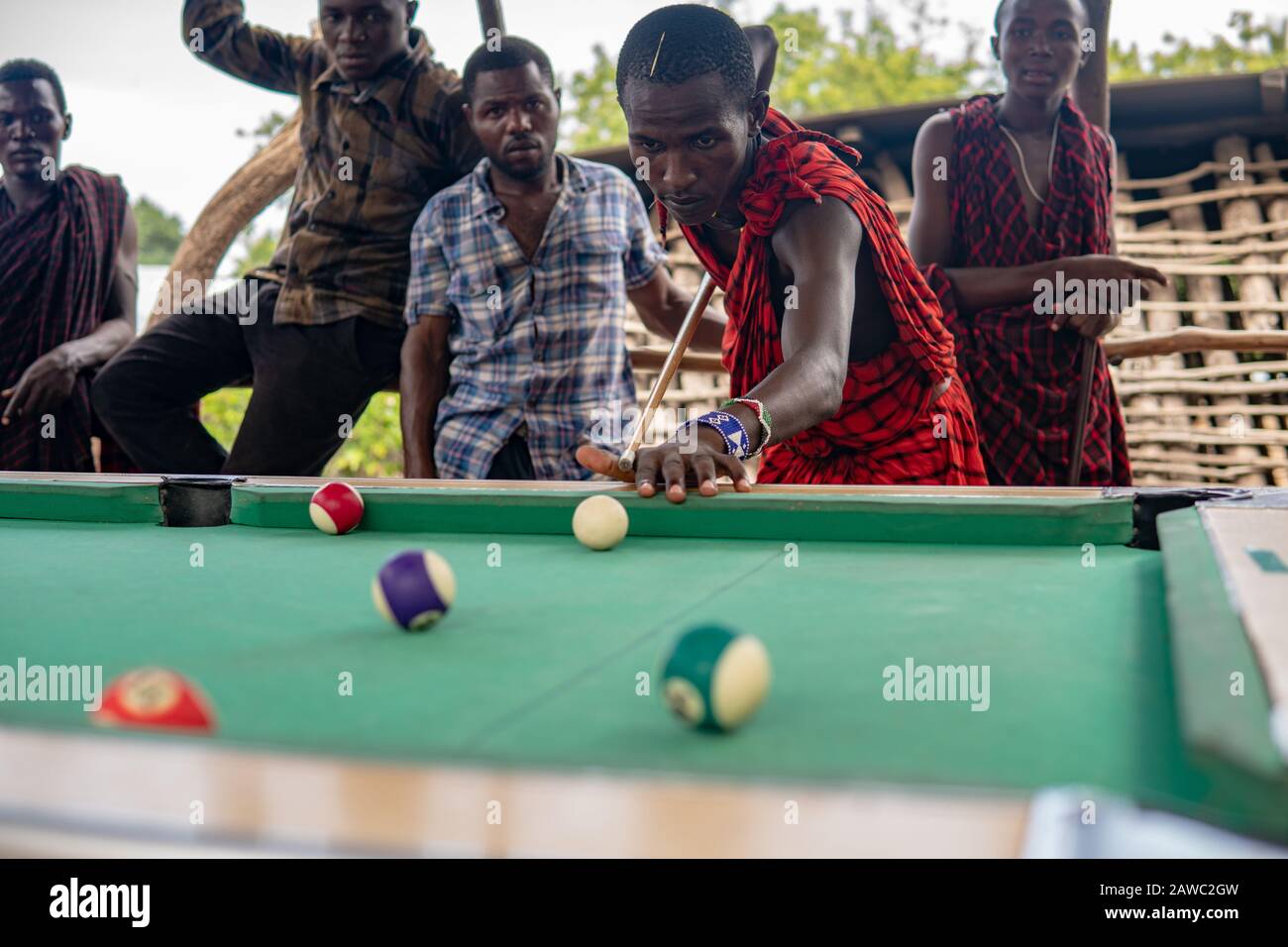 TANZANIA, NATRON LAKE - JANUARY 2020: African masai men playing open ...