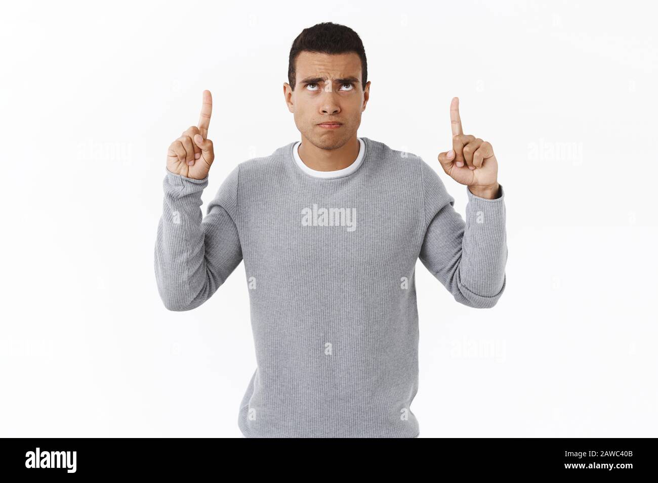 Anxious and unconfident, cute nervous guy cant make decision, standing ...