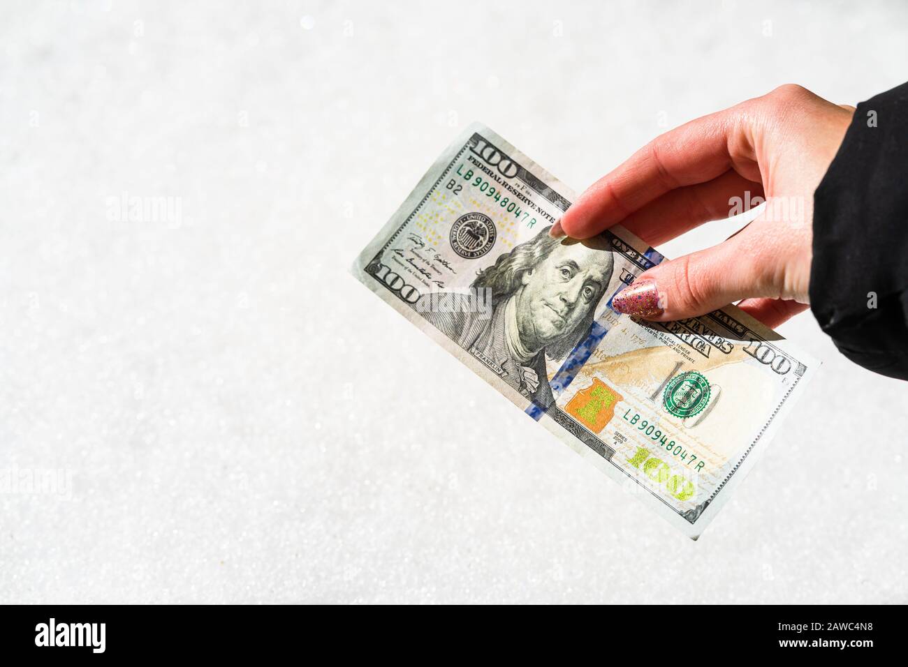 Woman hand holding and giving money. World money concept, close up of ...