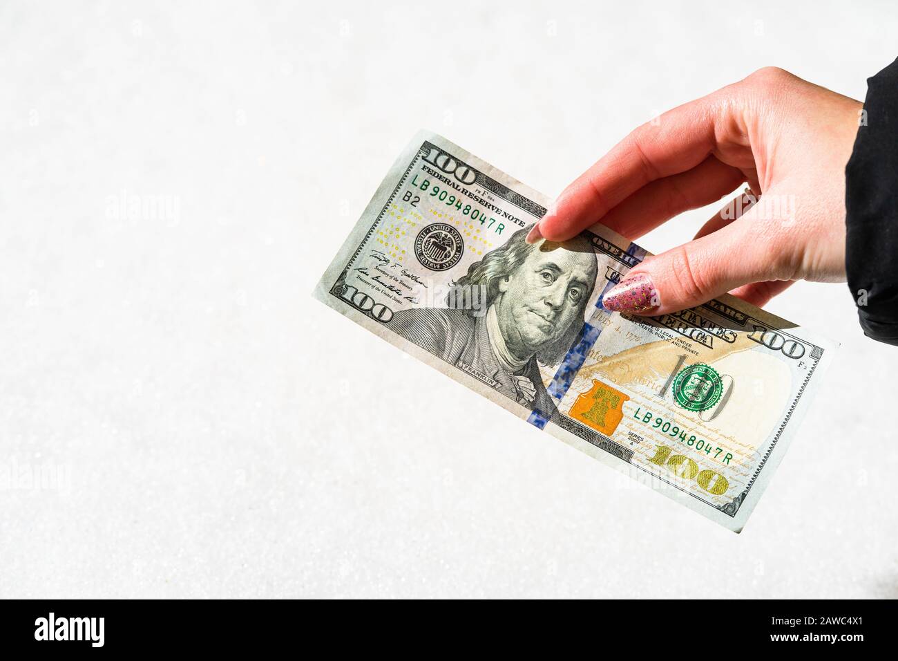 Woman hand holding and giving money. World money concept, close up of ...