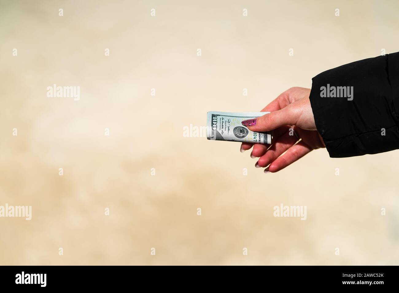 Woman hand holding and giving money. World money concept, close up of ...
