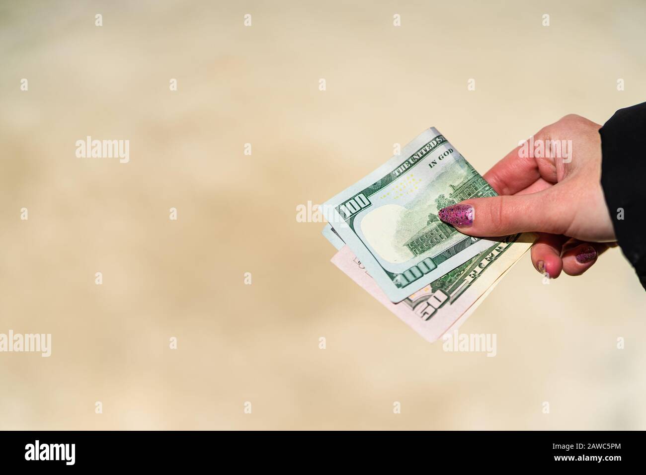 Woman hand holding and giving money. World money concept, close up of ...