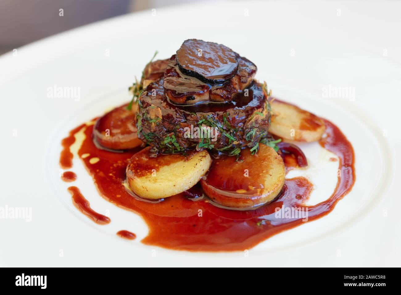 Tenderloin steak with foie gras and truffle, French dish Stock Photo ...