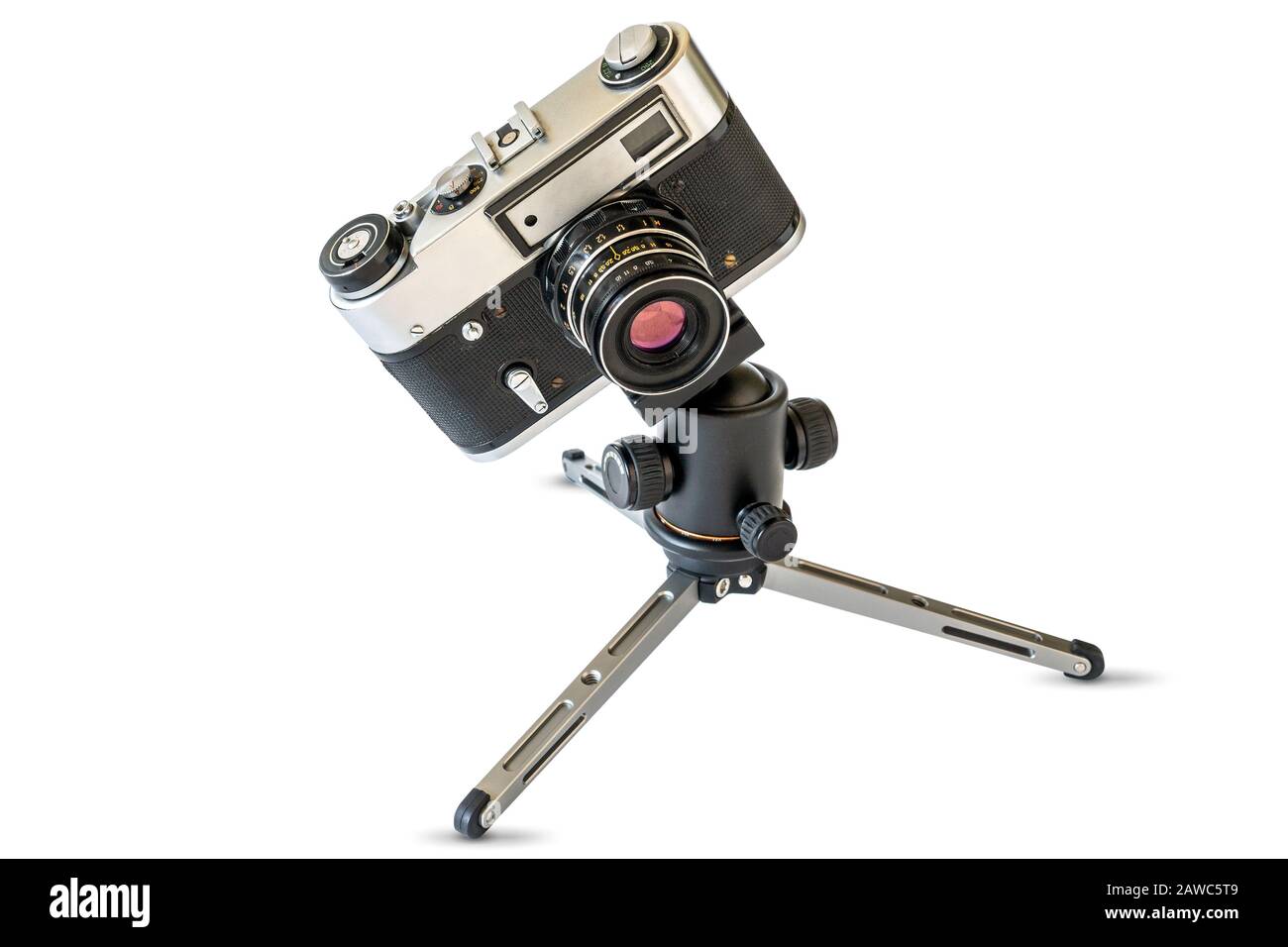 Retro film camera on mini tripod, isolated on white background Stock ...