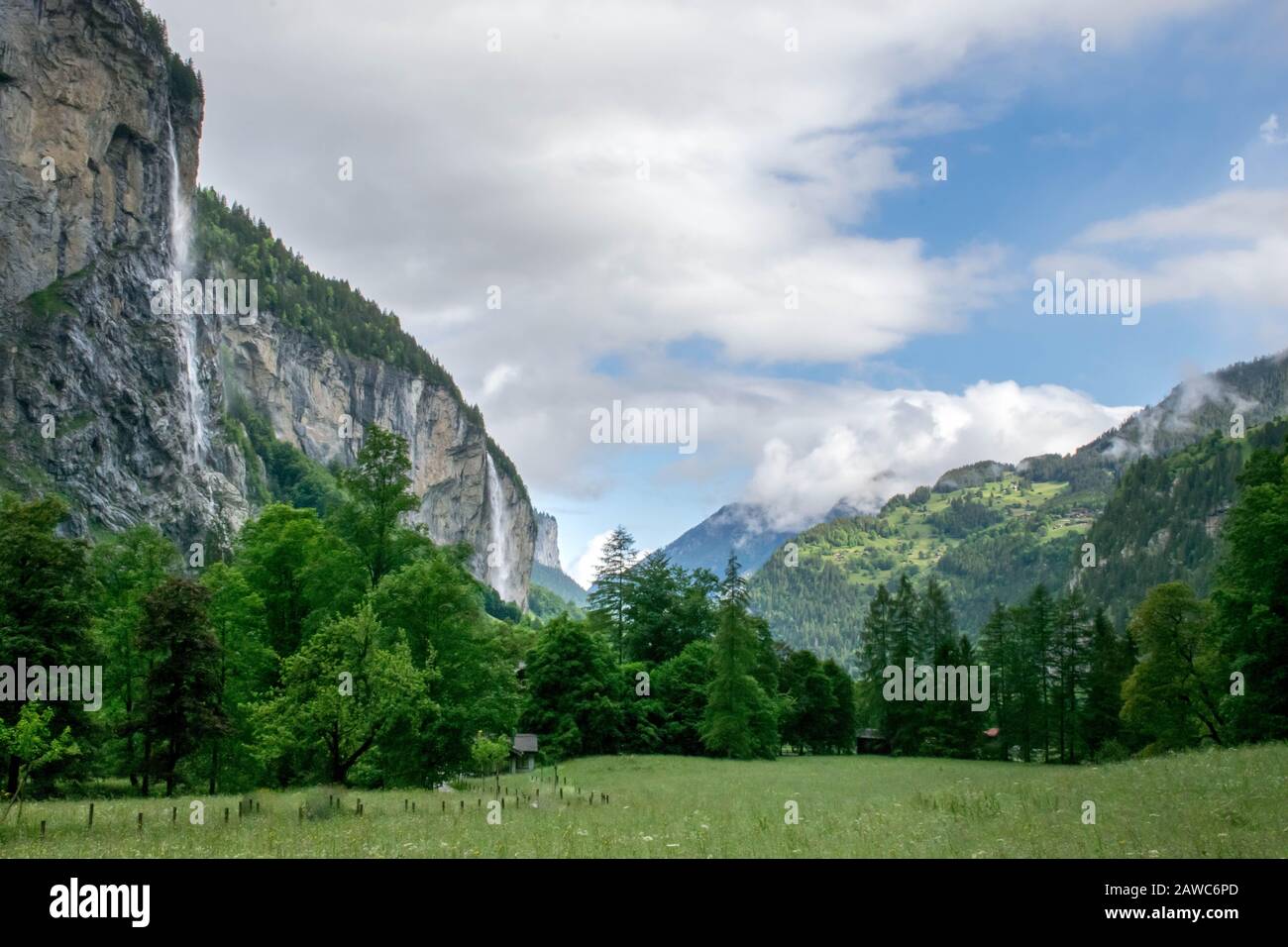 Alpine waterfall walley near Lauterbrunnen village, Switzerland Stock ...