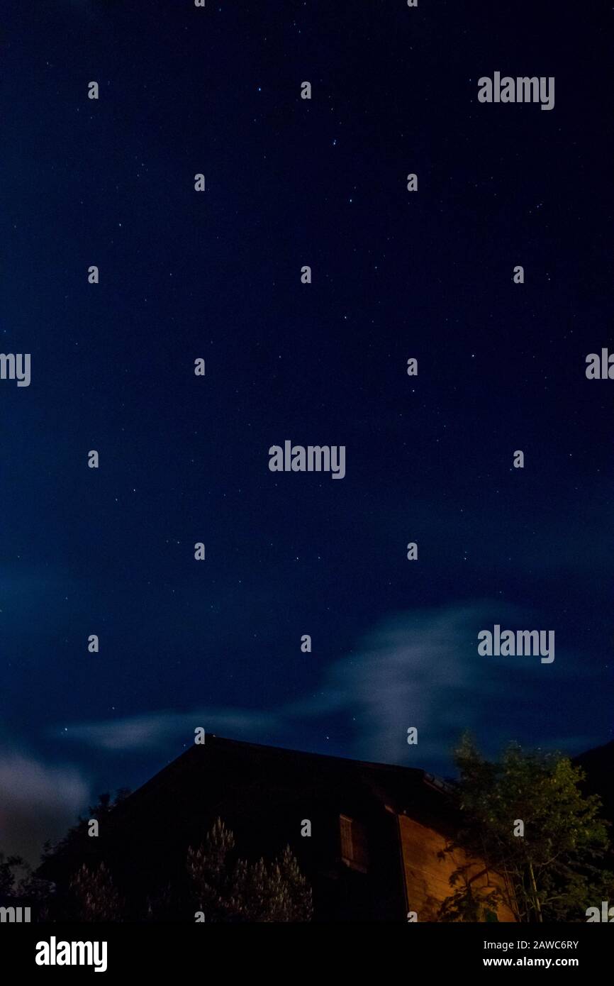 View on single house and night star sky with the Big Dipper ...
