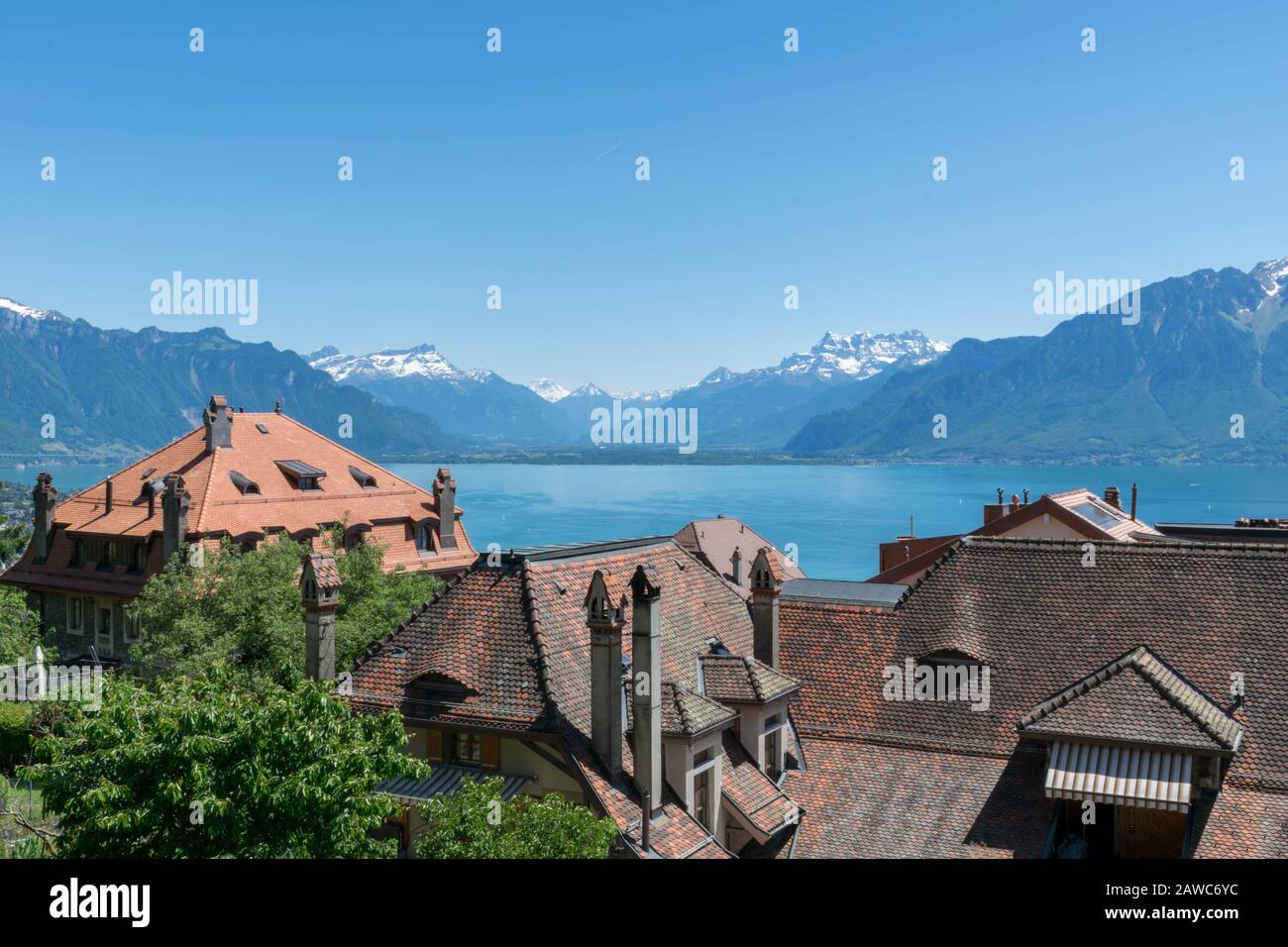 Roofs of village near Geneva Lake and Alps Mountains, Switzerland Stock ...