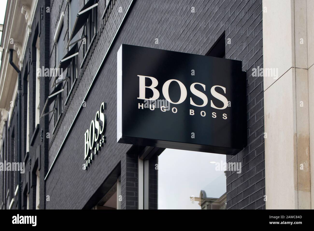 View of signage of German fashion goods manufacturer's store on on ...