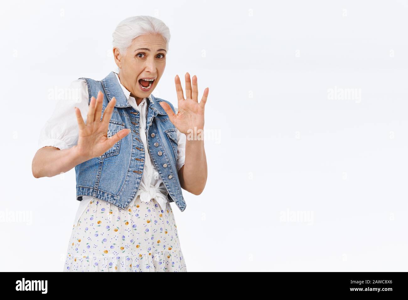 Scared speechless, shocked timid senior woman being victim of attack ...