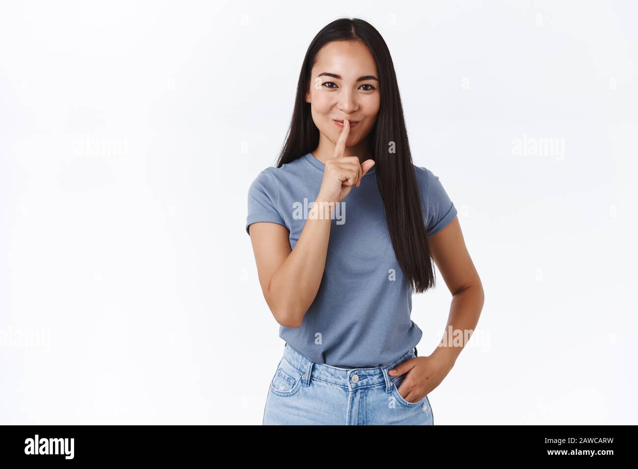 Finger over lip hi-res stock photography and images - Alamy