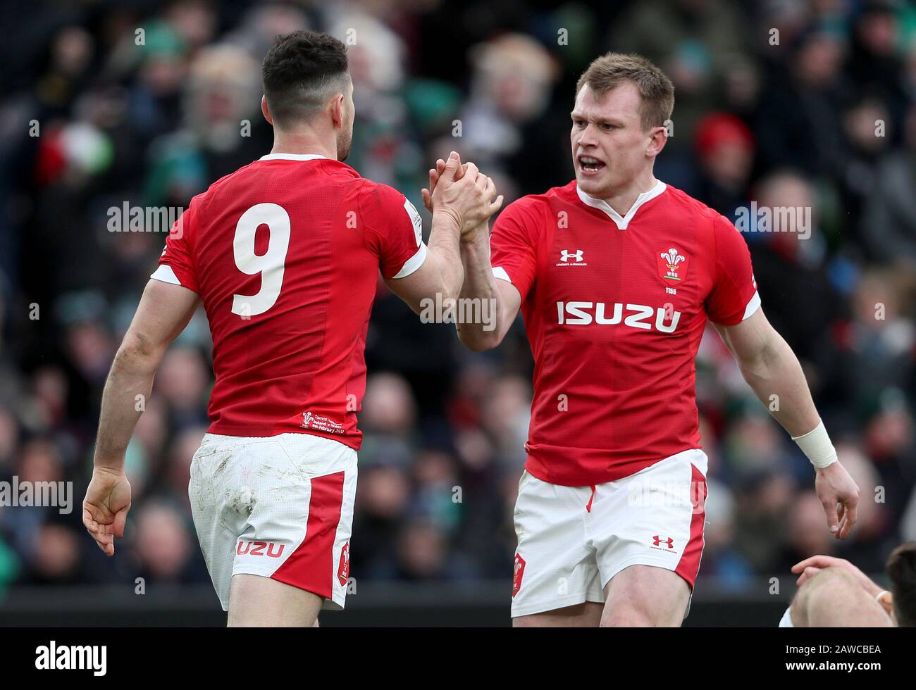 Wales' Tomos Williams (left) celebrates with Nick Tompkins after ...