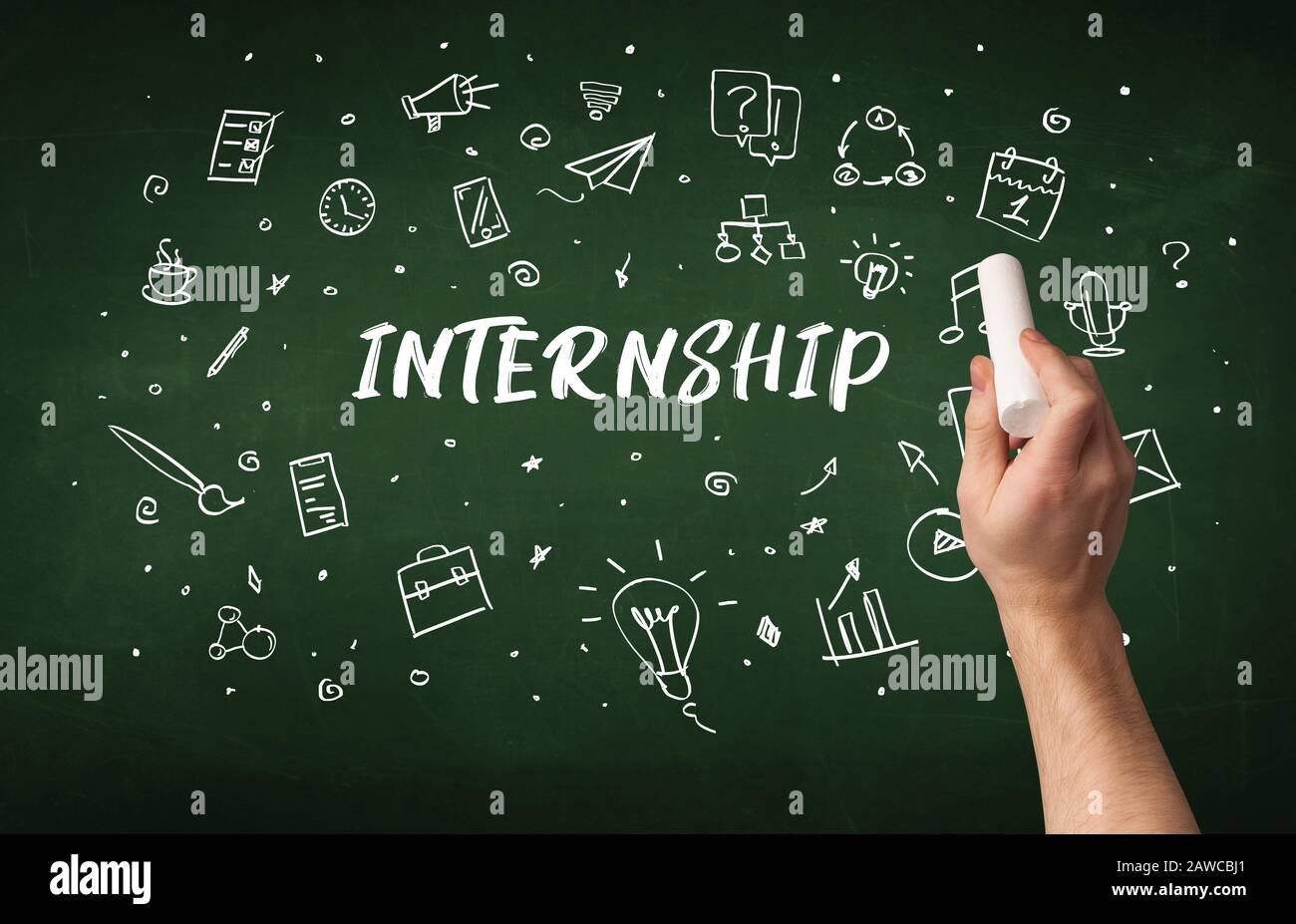 Hand drawing INTERNSHIP inscription with white chalk on blackboard ...