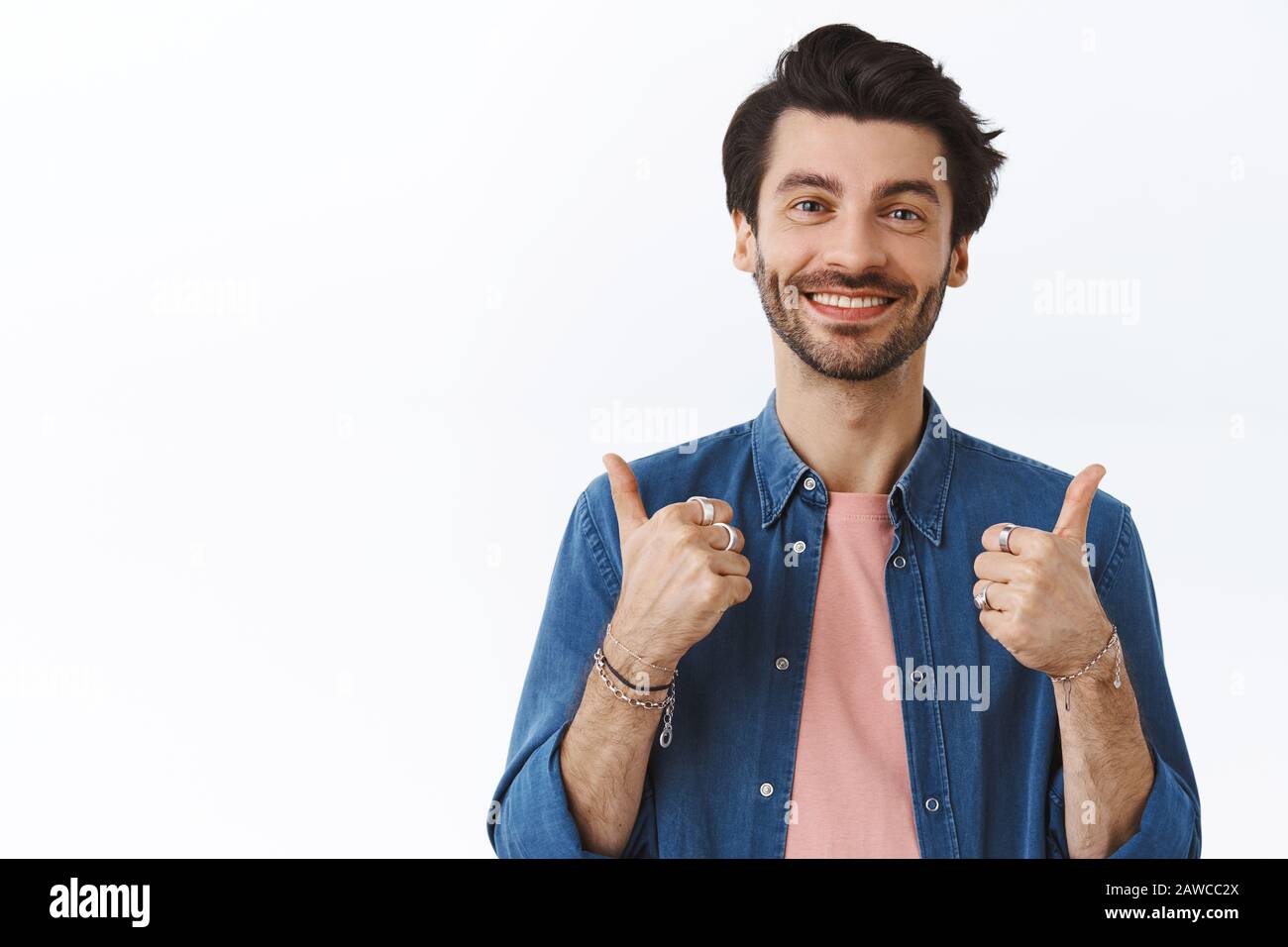 Supportive, good-looking charming boyfriend with beard, show thumbs-up ...