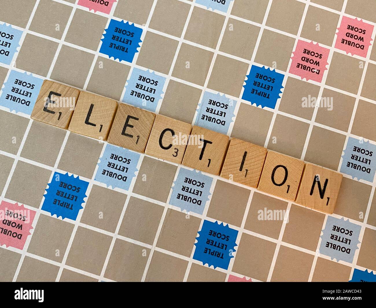 Spelling spell out with scrabble tiles hi-res stock photography and ...