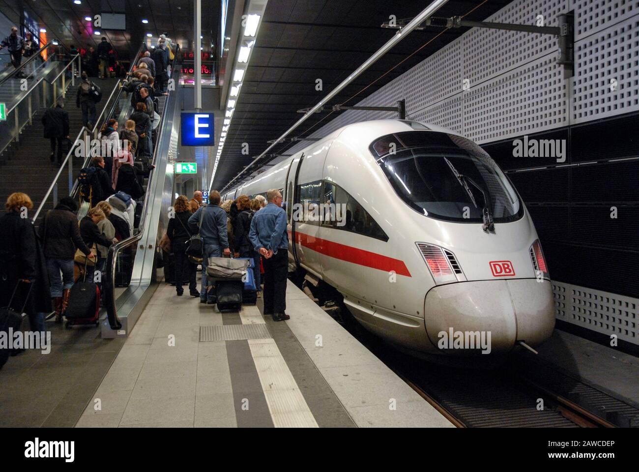 Rail passengers boarding the Inter City Express (ICE) at Berlin rail ...