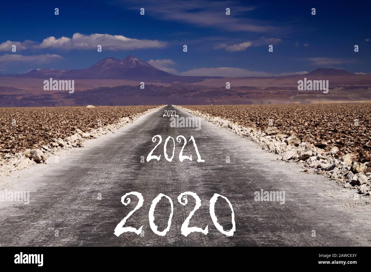 Long hard stony way concept: view on endless dirt road through dry ...